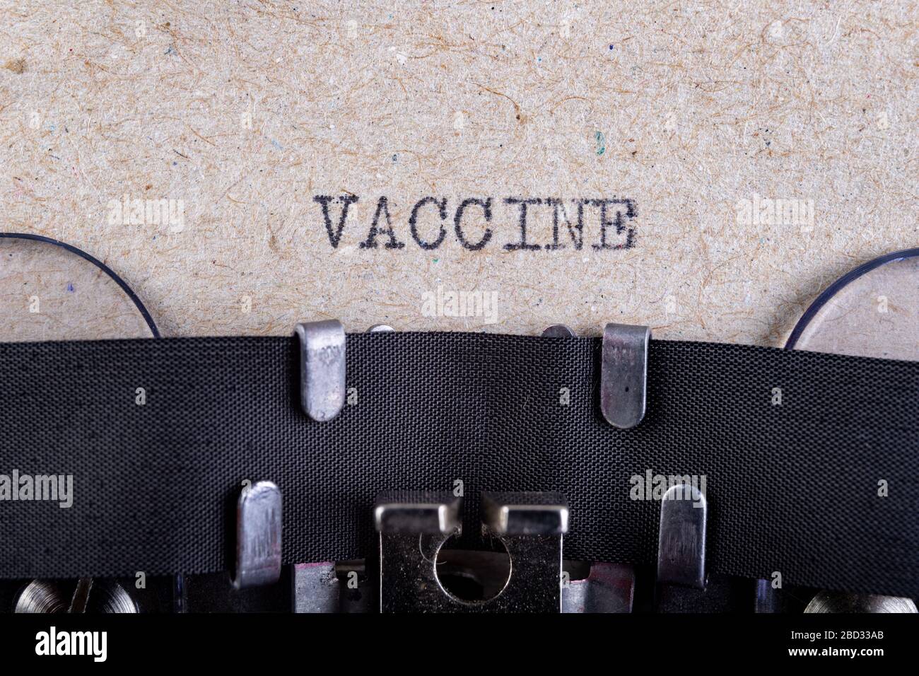 The word vaccine written in typewriter font. The inscription in the old ...