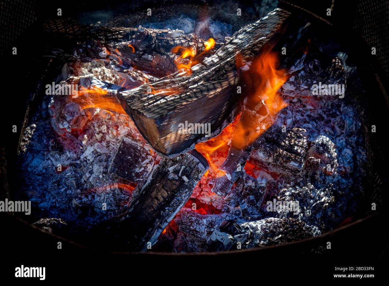 Fire flame, burning wood at the fireplace. Firewood log in the fire ...