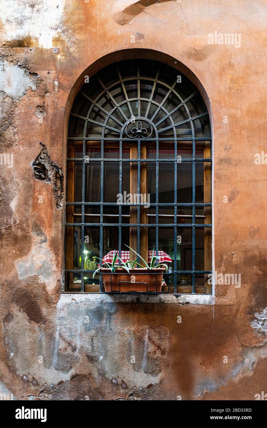 Old iron window with dome Stock Photo - Alamy