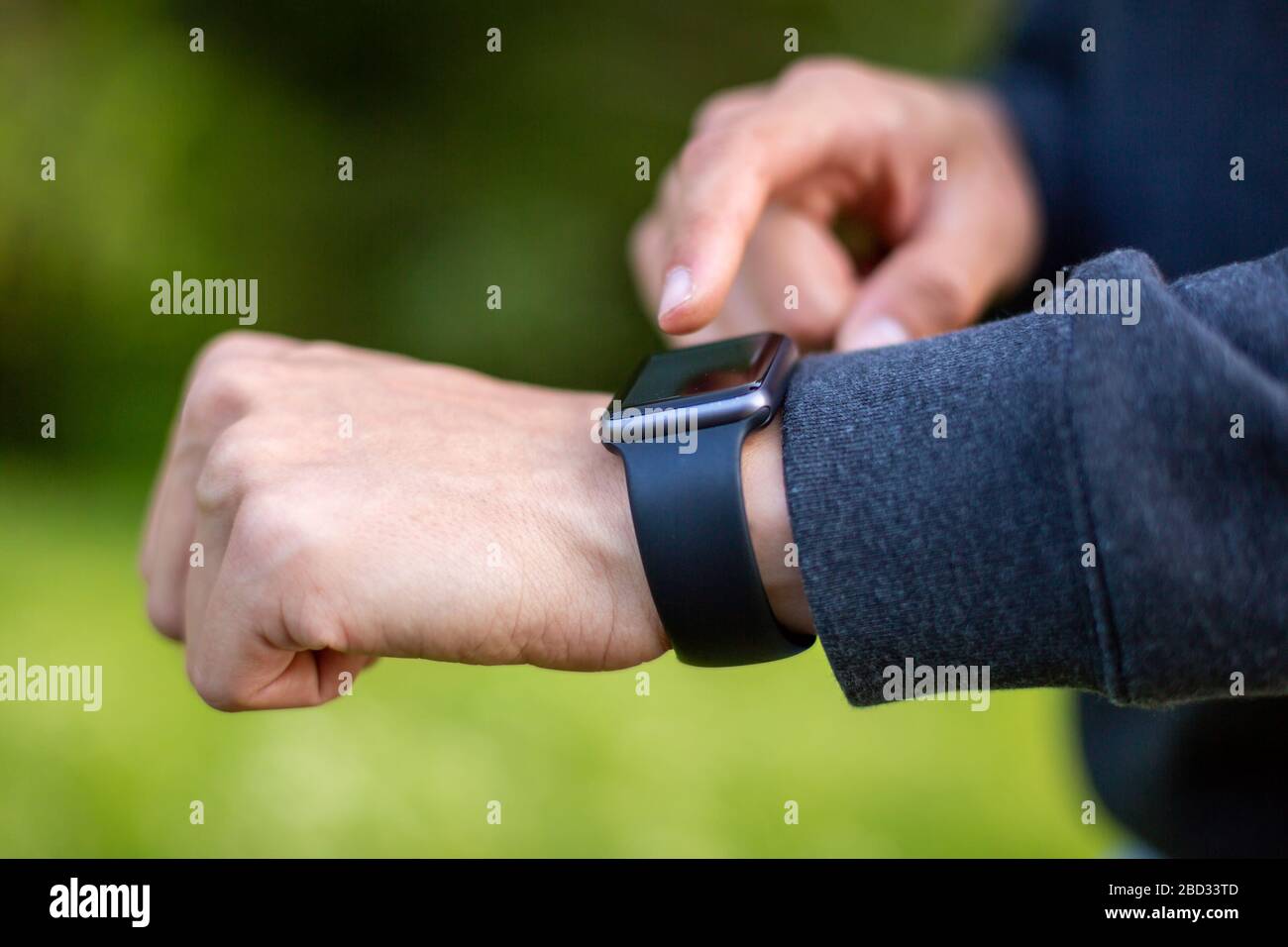 Man using smartwatch app in hi-res stock photography and images - Alamy