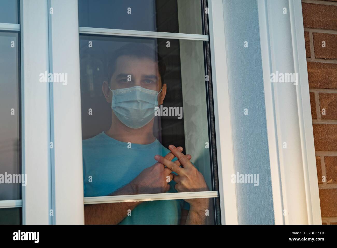 Forced self isolation during coronavirus hi-res stock photography and ...