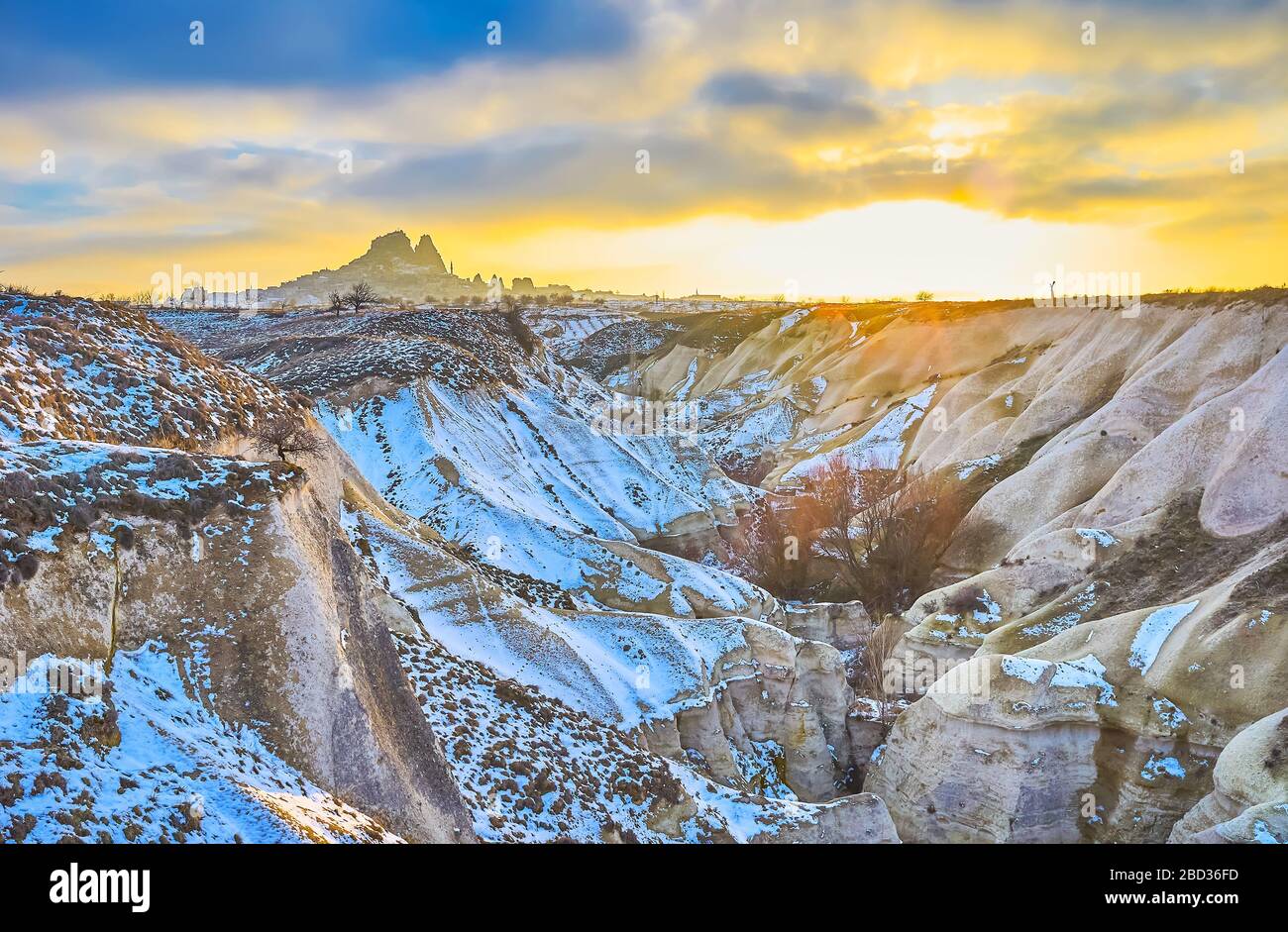The view on fairy sunset over Uchisar rock castle, from the streamlined ...