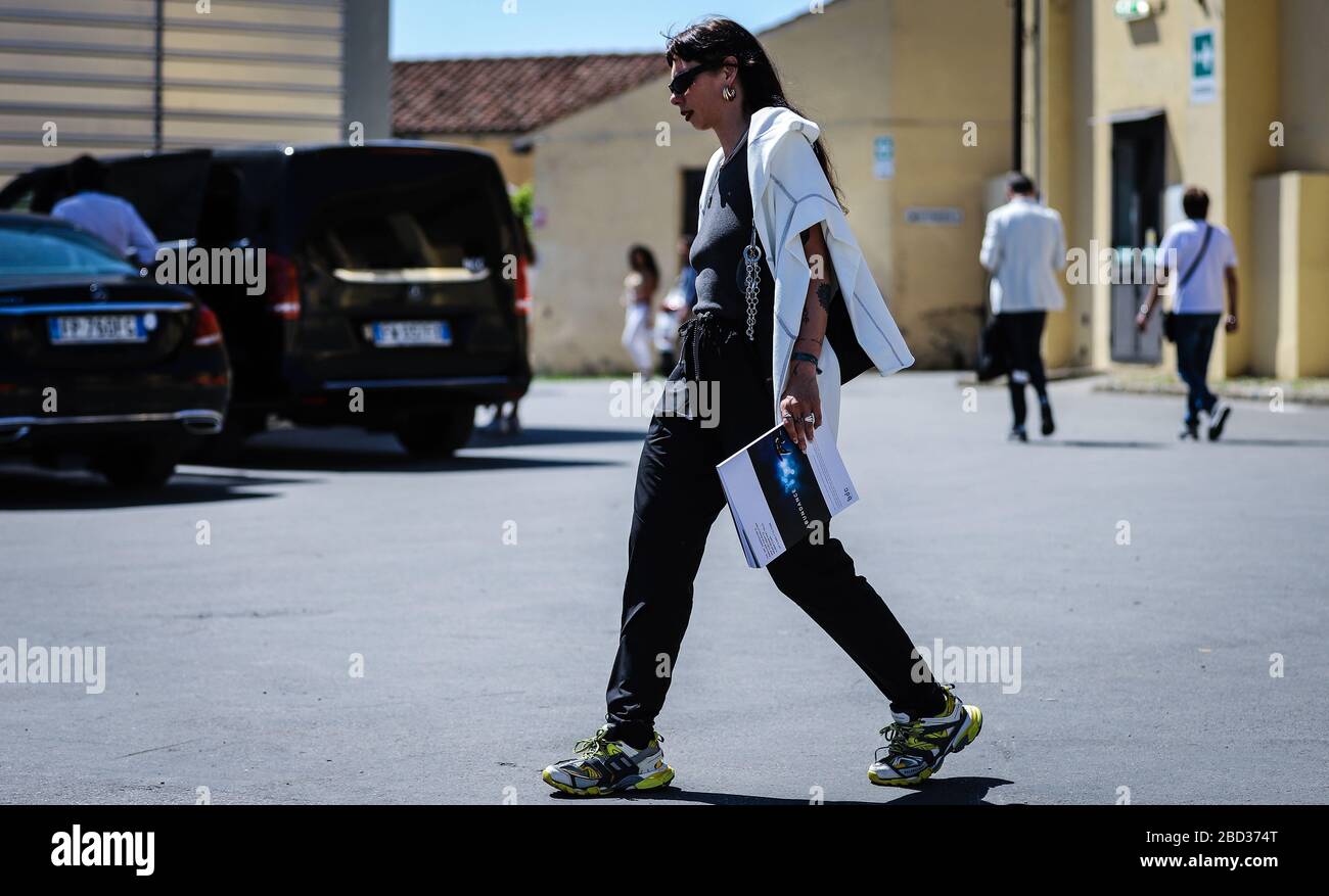 FLORENCE, Italy- June 13 2019: Women on the street during the Pitti 96 ...
