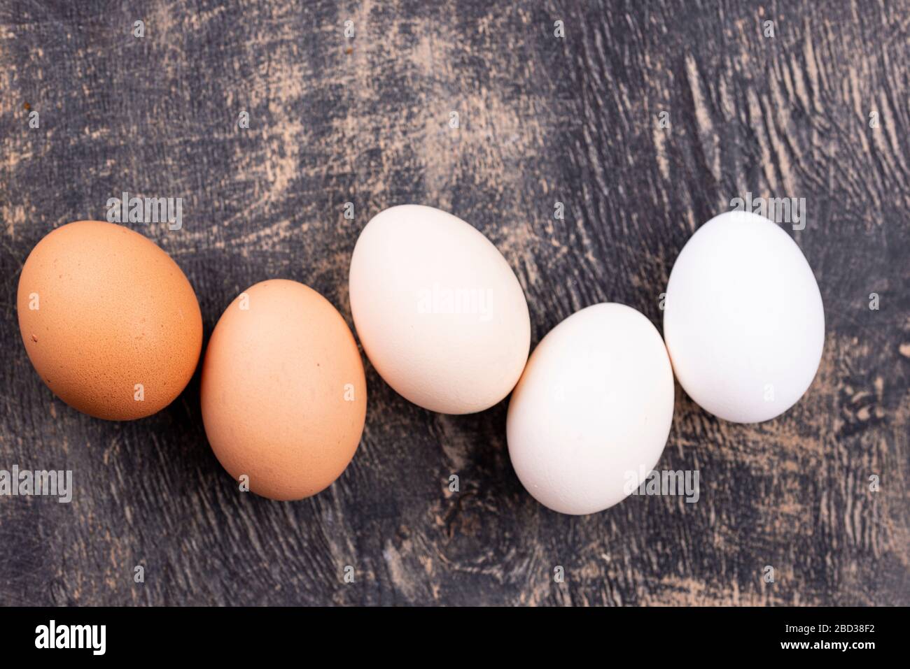Chicken eggs gradient from light to dark Stock Photo - Alamy