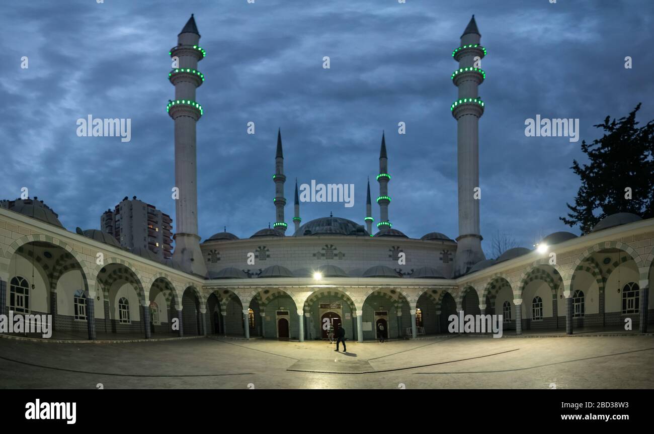 People entering a turkish mosque in a cloudy night Stock Photo - Alamy