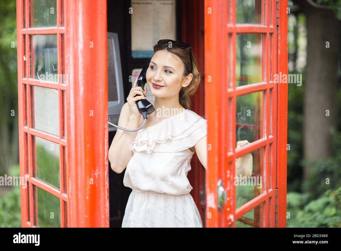 Using a payphone hi-res stock photography and images - Alamy