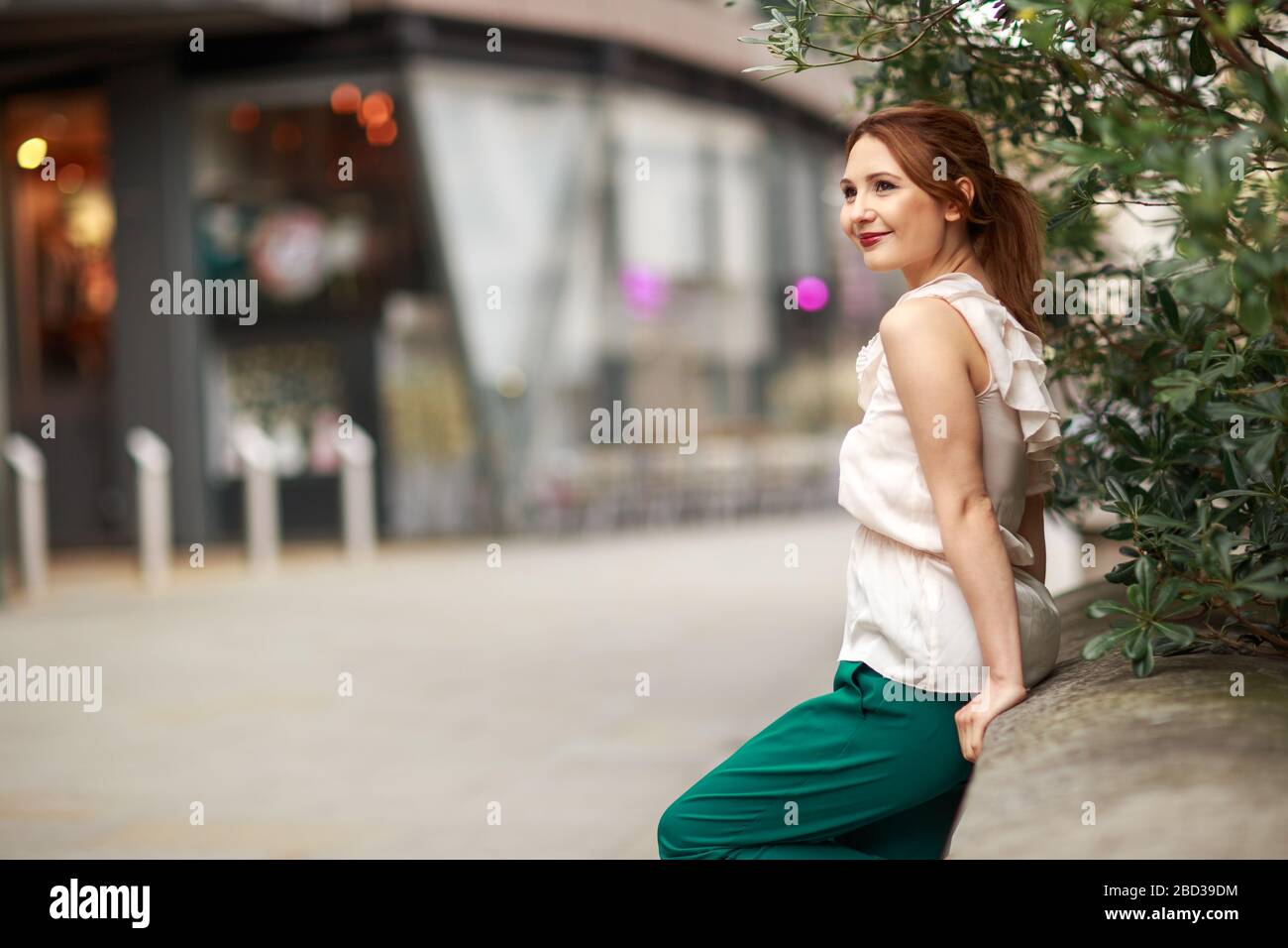 portrait of a cute looking woman Stock Photo - Alamy