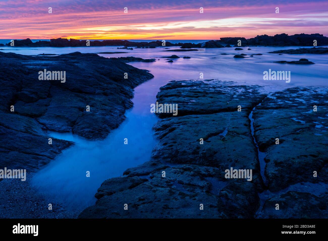 Magenta edged afterglow lights up the Pacific Ocean near Mazatlan ...