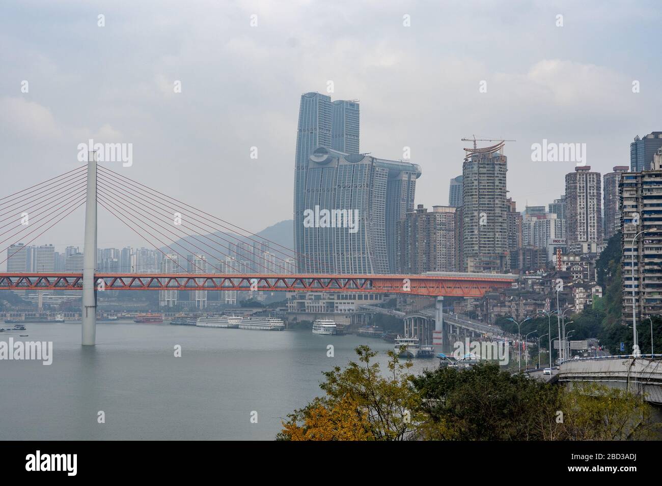 Chongqing, China - Dec 21, 2019: Qian si men suspension bridge with sky ...