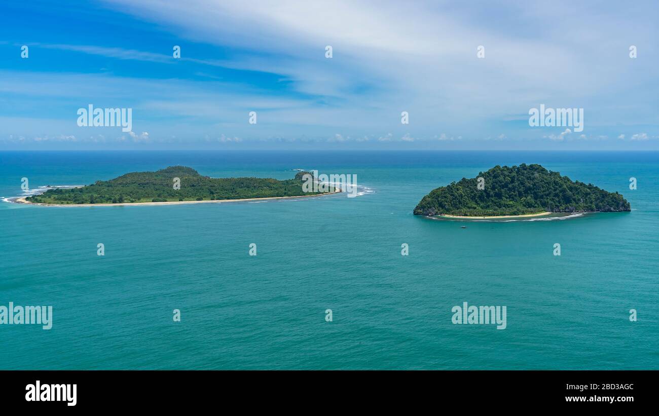 Two beautiful forested islands offshore surrounded by beautiful ...