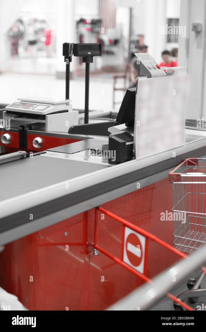 Empty cash desk with closed way border in supermarket Stock Photo - Alamy