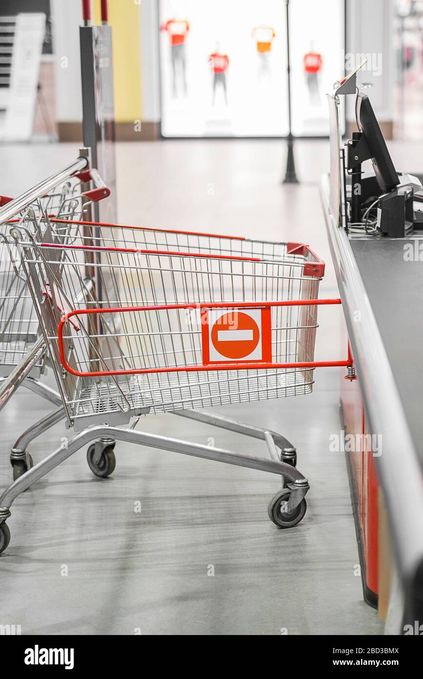 Empty cash desk with closed way border in supermarket Stock Photo - Alamy