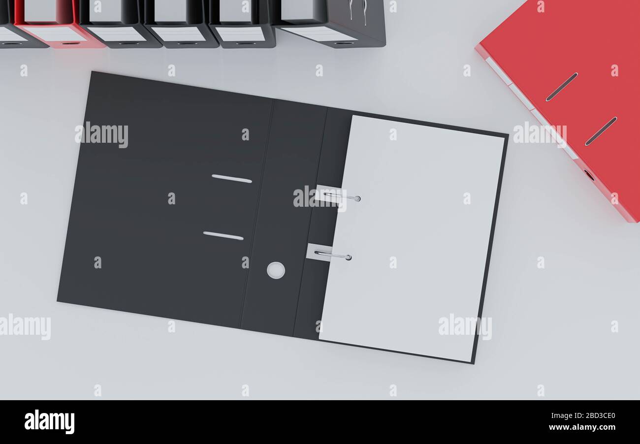 document folders standing on white desk in office loft with copy space ...