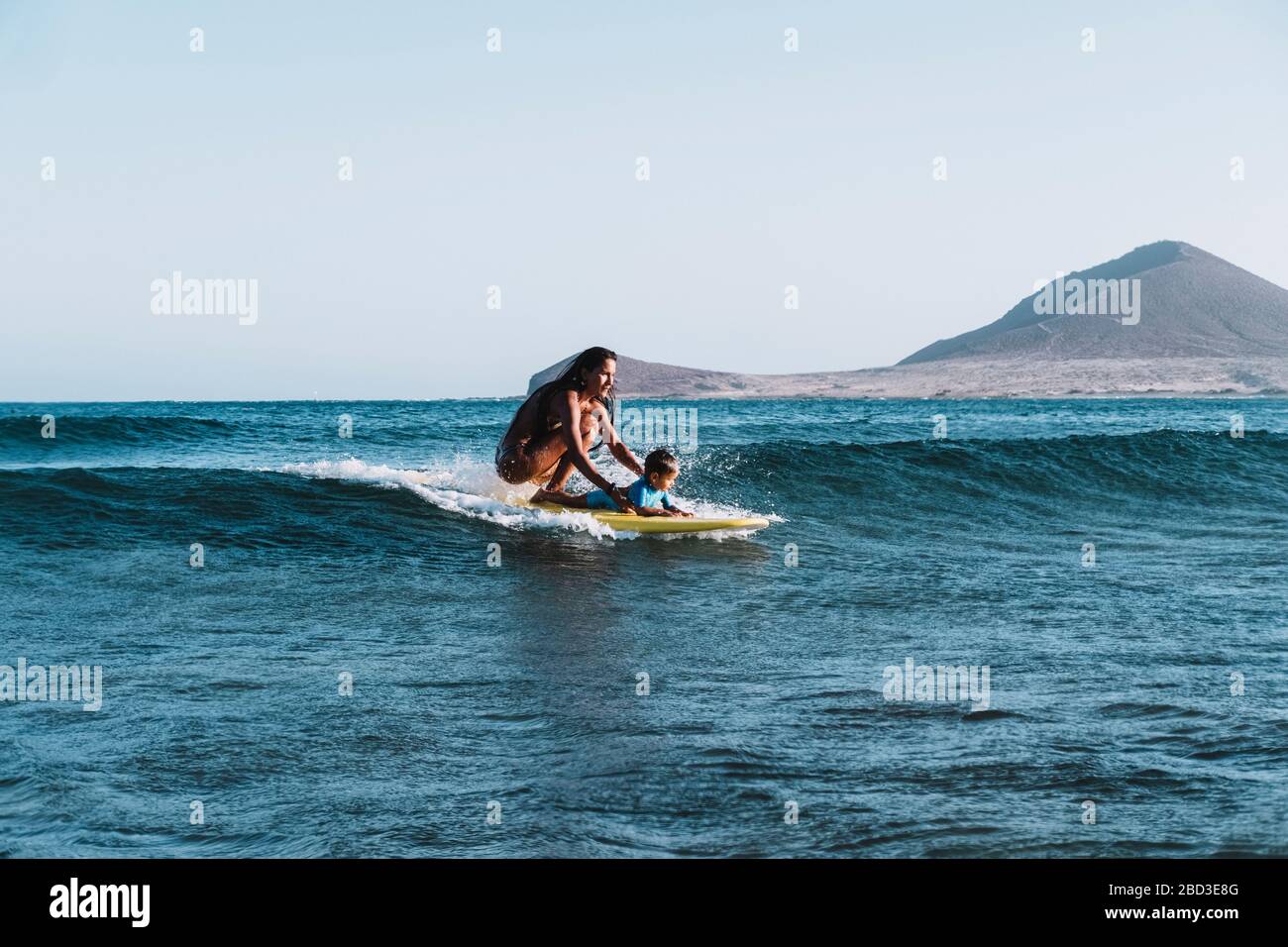 Surfing child wave hi-res stock photography and images - Alamy