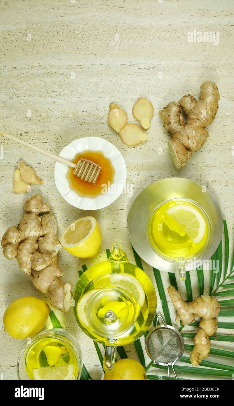 Ginger and lemon herbal tea preparation flat lay, with its high levels ...