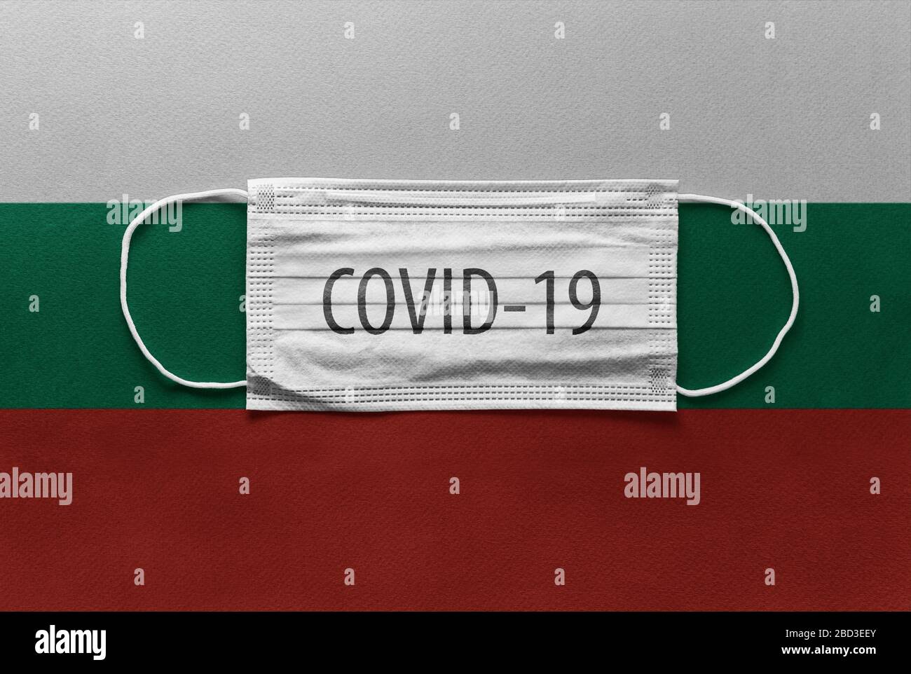 An individual face medical surgical mask on Bulgaria national flag ...