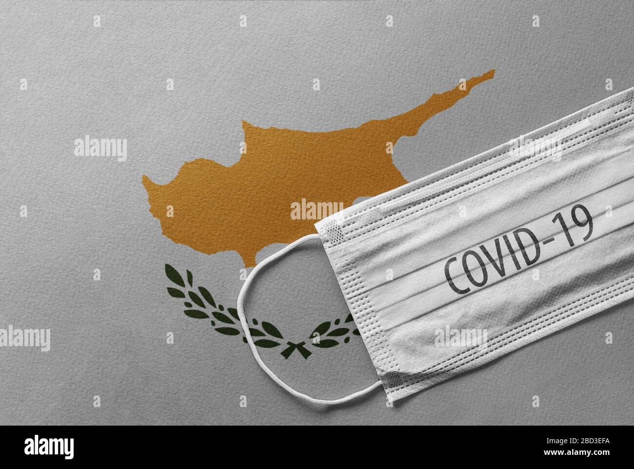 An individual face medical surgical mask on Cyprus national flag ...
