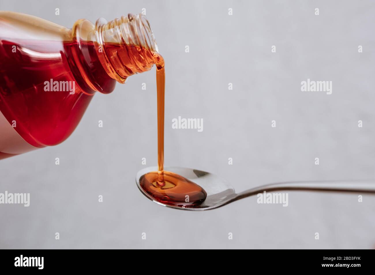 Liquid Medicine Pouring Into Spoon High Resolution Stock Photography ...