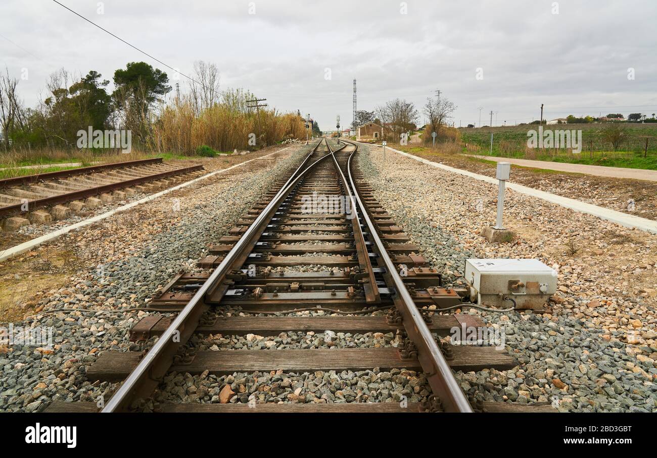 Change of train tracks with electric motor Stock Photo - Alamy