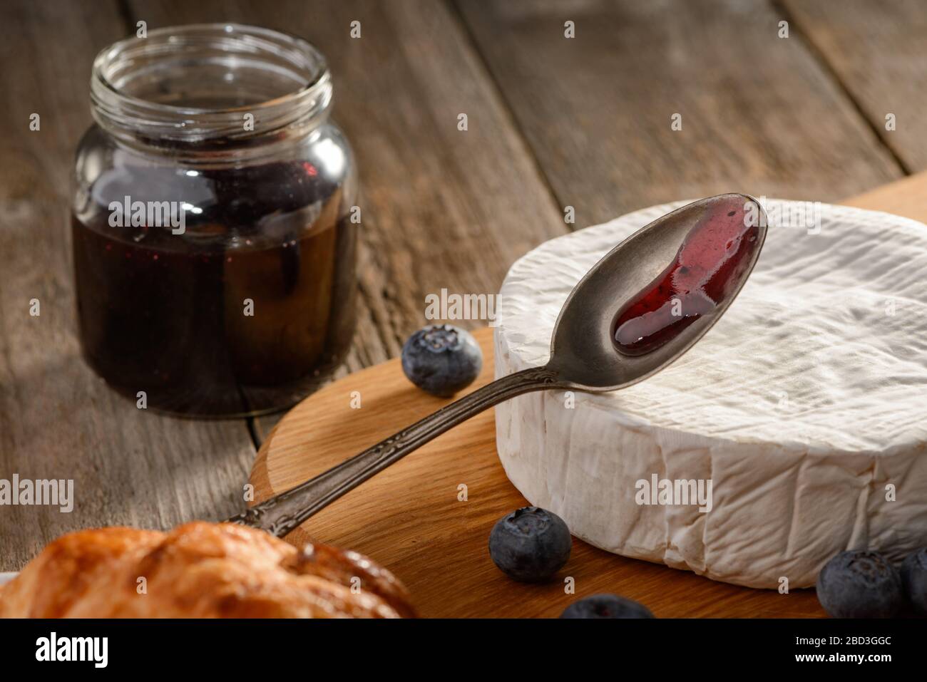 Blueberries and soft Camembert cheese. French breakfast Stock Photo - Alamy