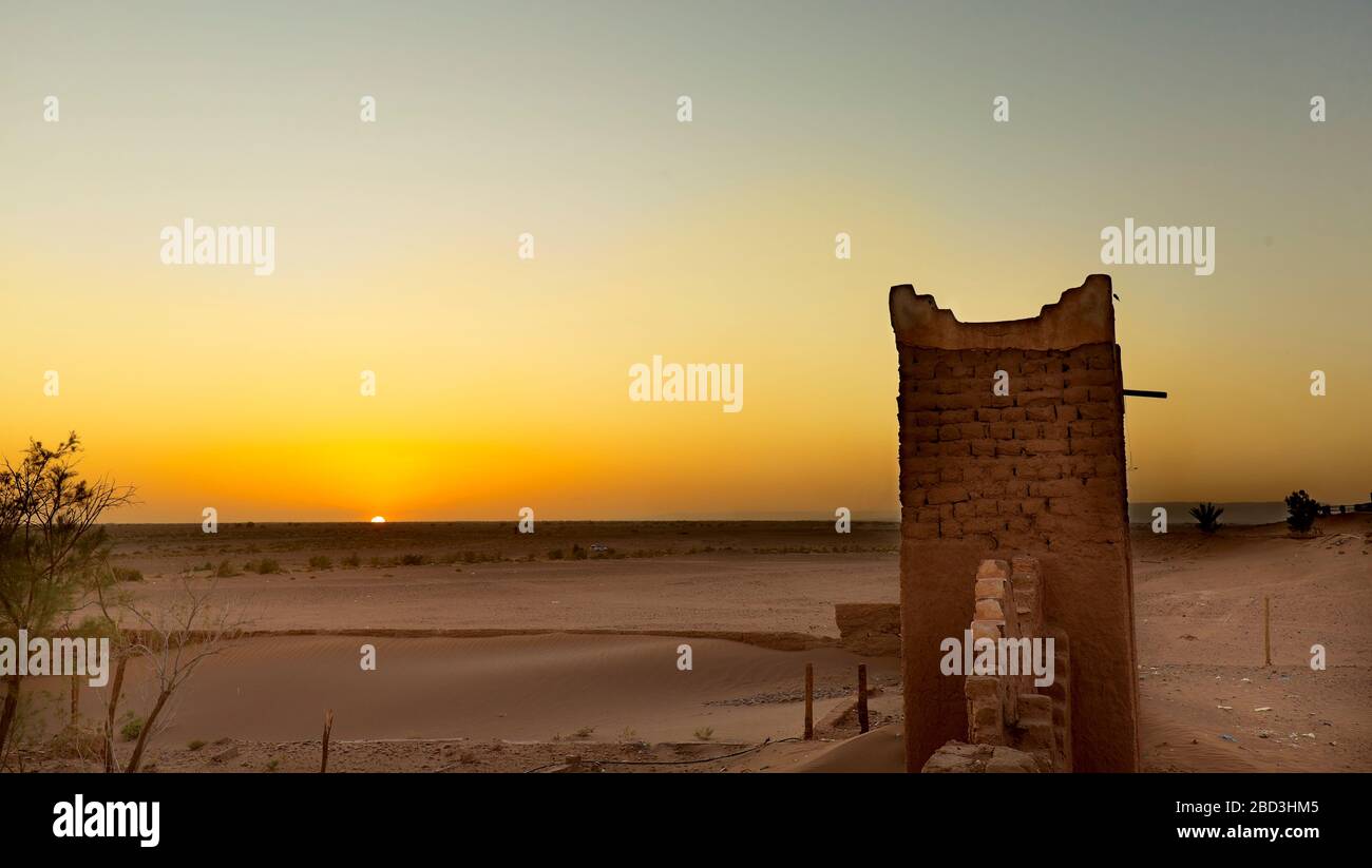 Sunset at M'Hamid El Ghizlane or Lamhamid Ghozlane is a small oasis ...