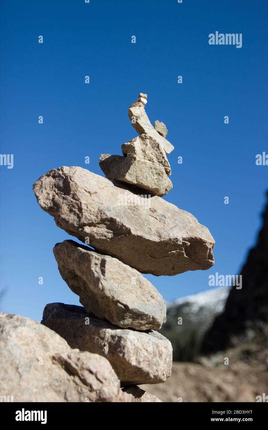 A pyramid of stones on the back of rocks. Different stones close-up ...
