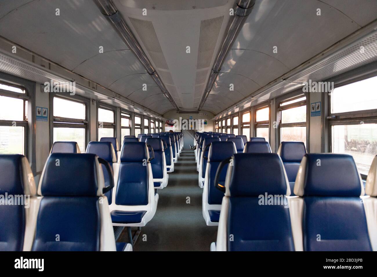 Electric train. An empty car of an intercity train. The train goes ...