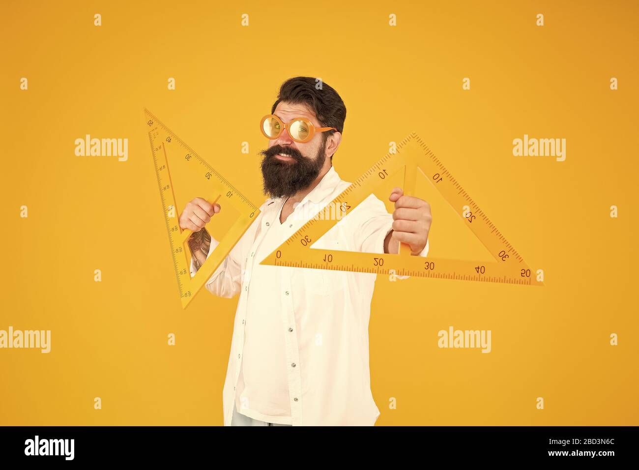 Man math lesson. Bearded nerd triangle. Geometry teacher. Student using ...