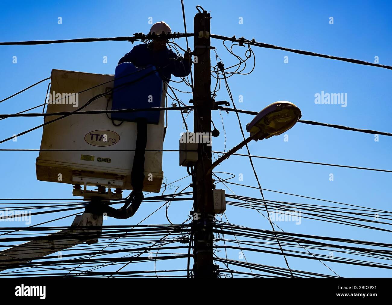Bucharest, Romania - April 06, 2020: An electrician repairs a high ...