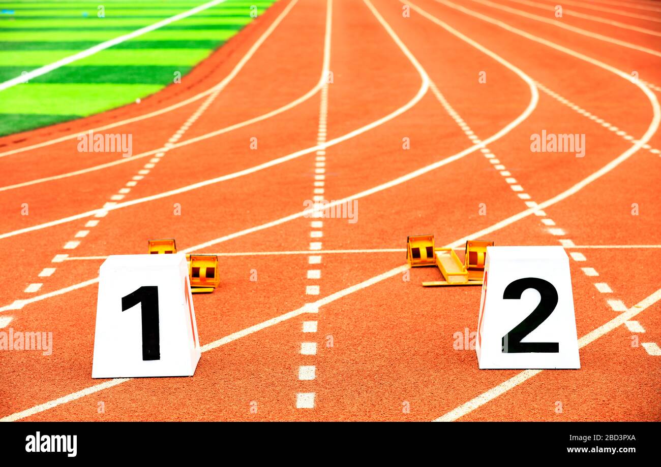 Starting blocks in the playground Stock Photo - Alamy