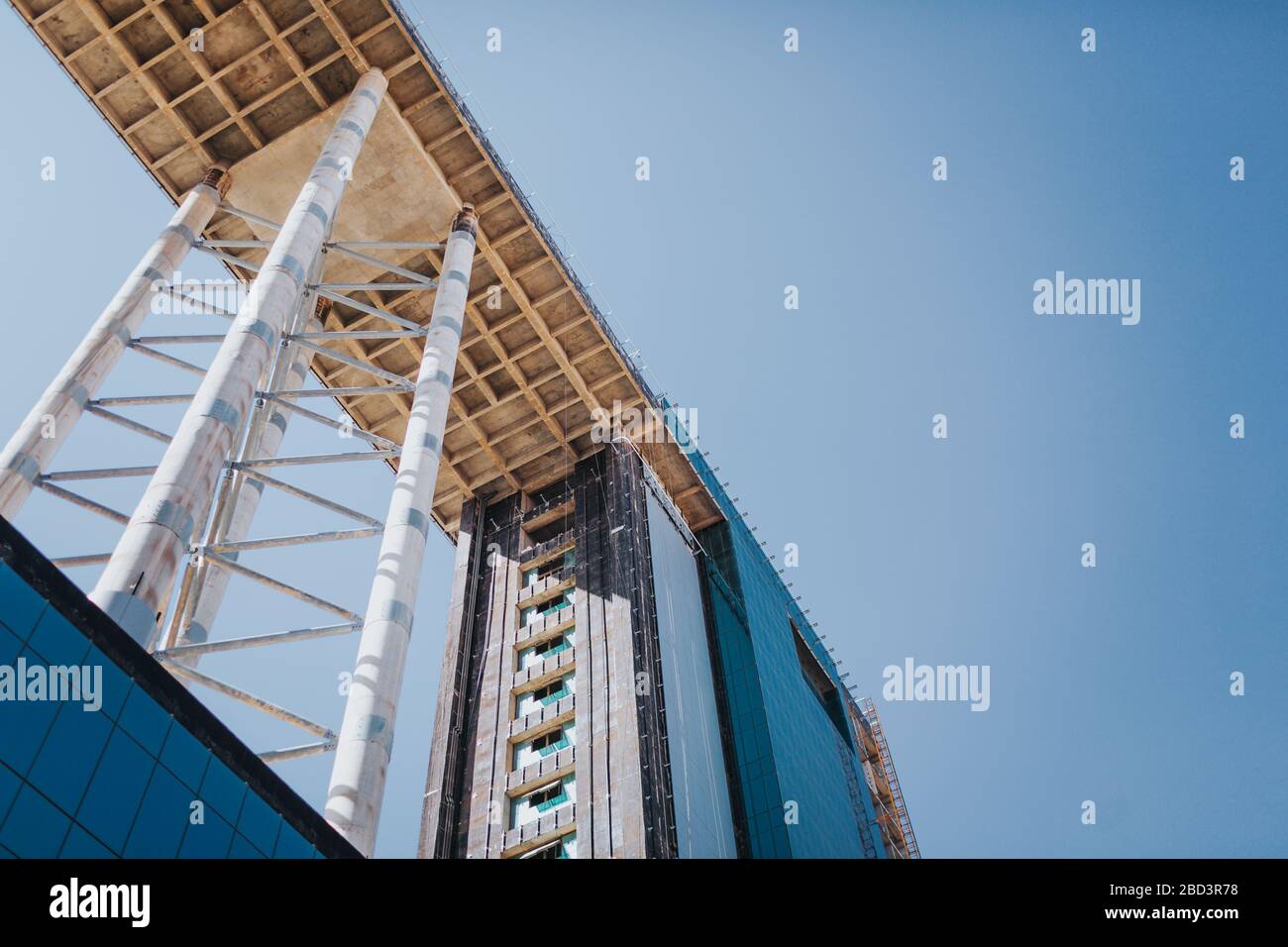 unfinished building, skyscraper photo on sky background Stock Photo - Alamy