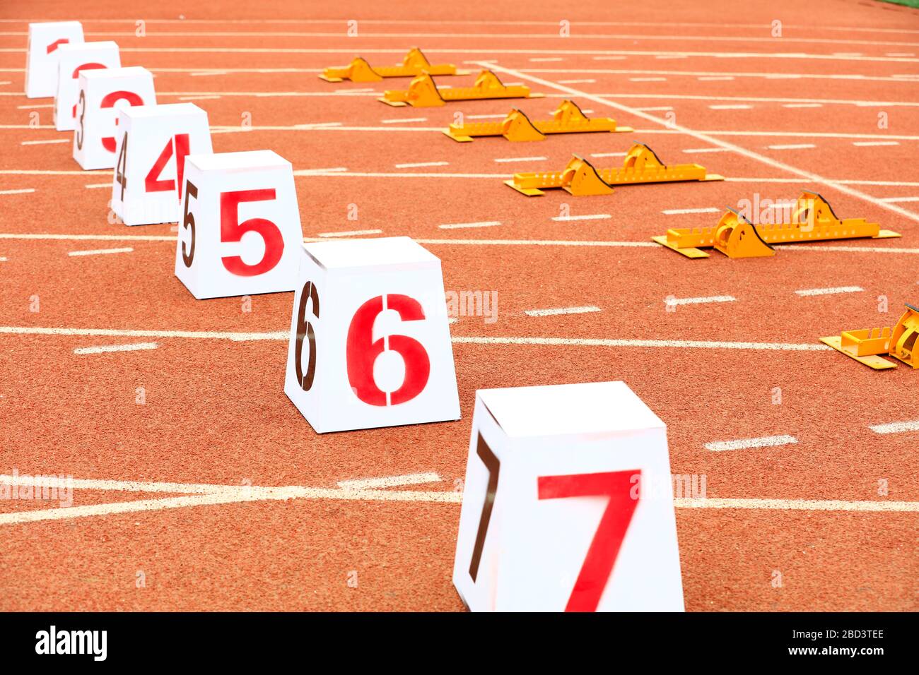 Starting blocks in the playground Stock Photo - Alamy