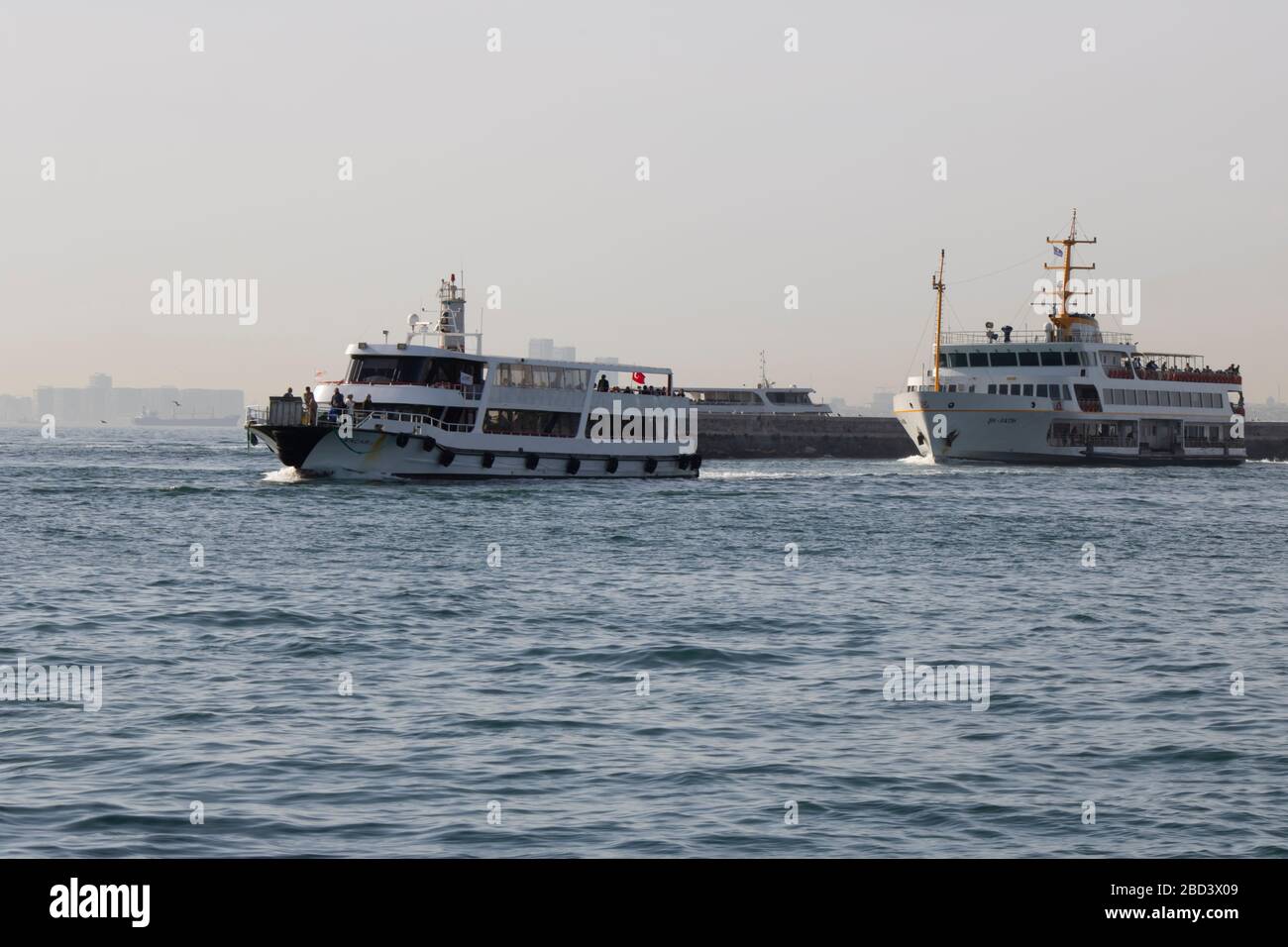 Small and large passenger ferries on the sea. Photographed in the ...