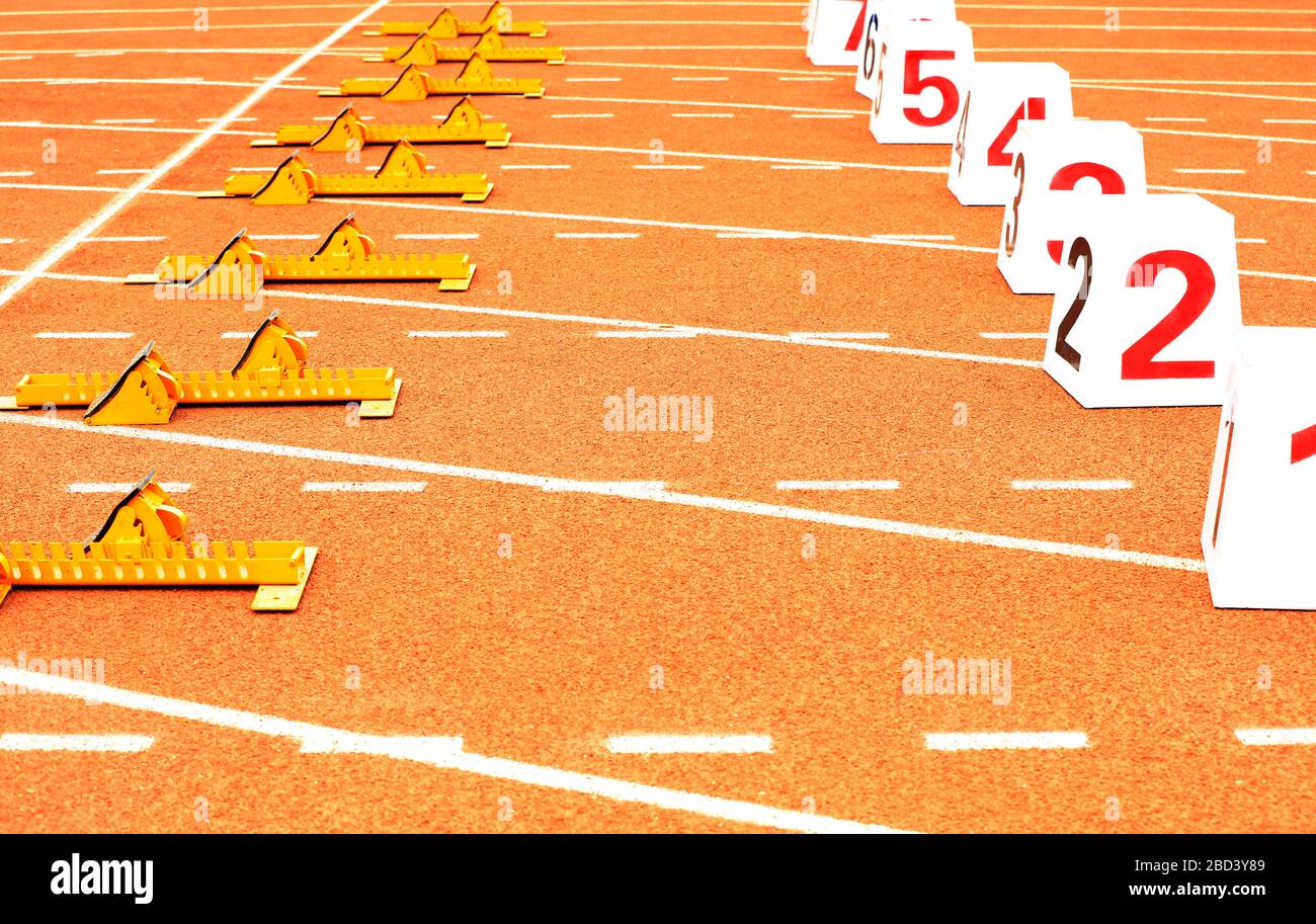Starting blocks in the playground Stock Photo - Alamy
