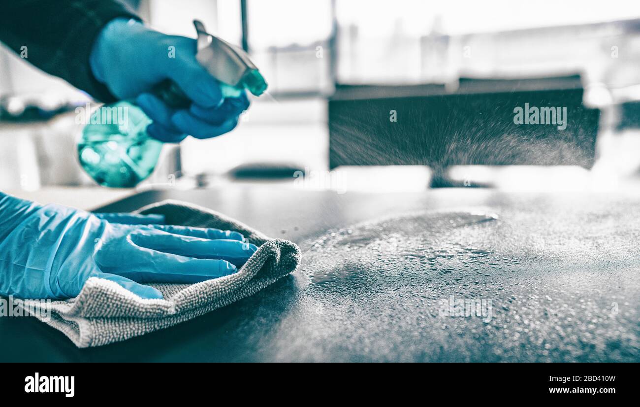 Cleaning home table sanitizing kitchen table surface with disinfectant ...