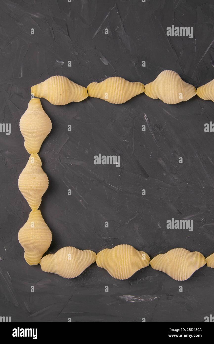 Conchiglie pasta shell composition in the shape of a rectangle with an ...