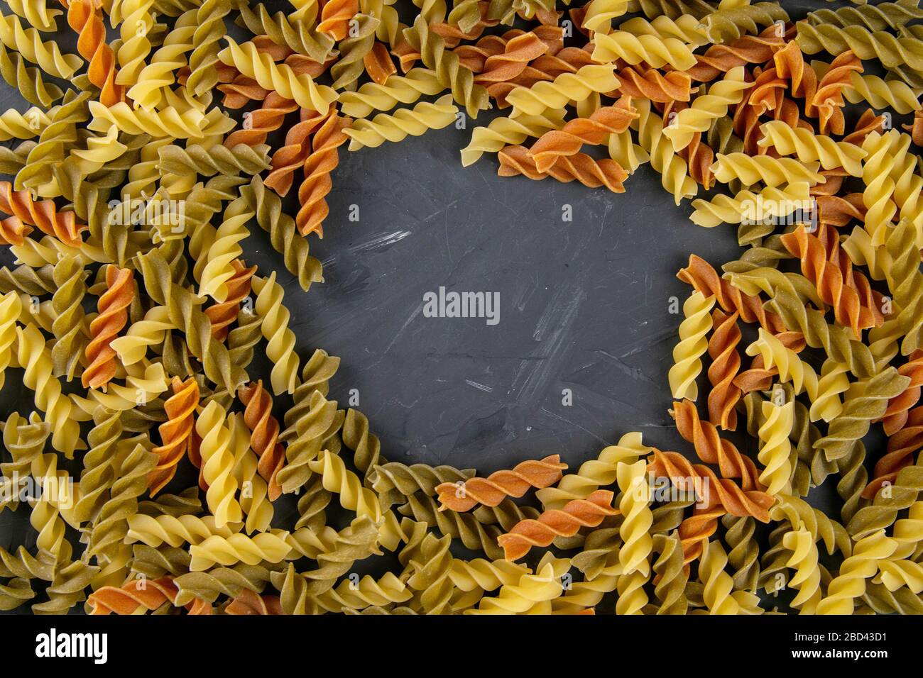Fusili pasta. Closeup of raw fusilli macaroni in spiral shape with ...