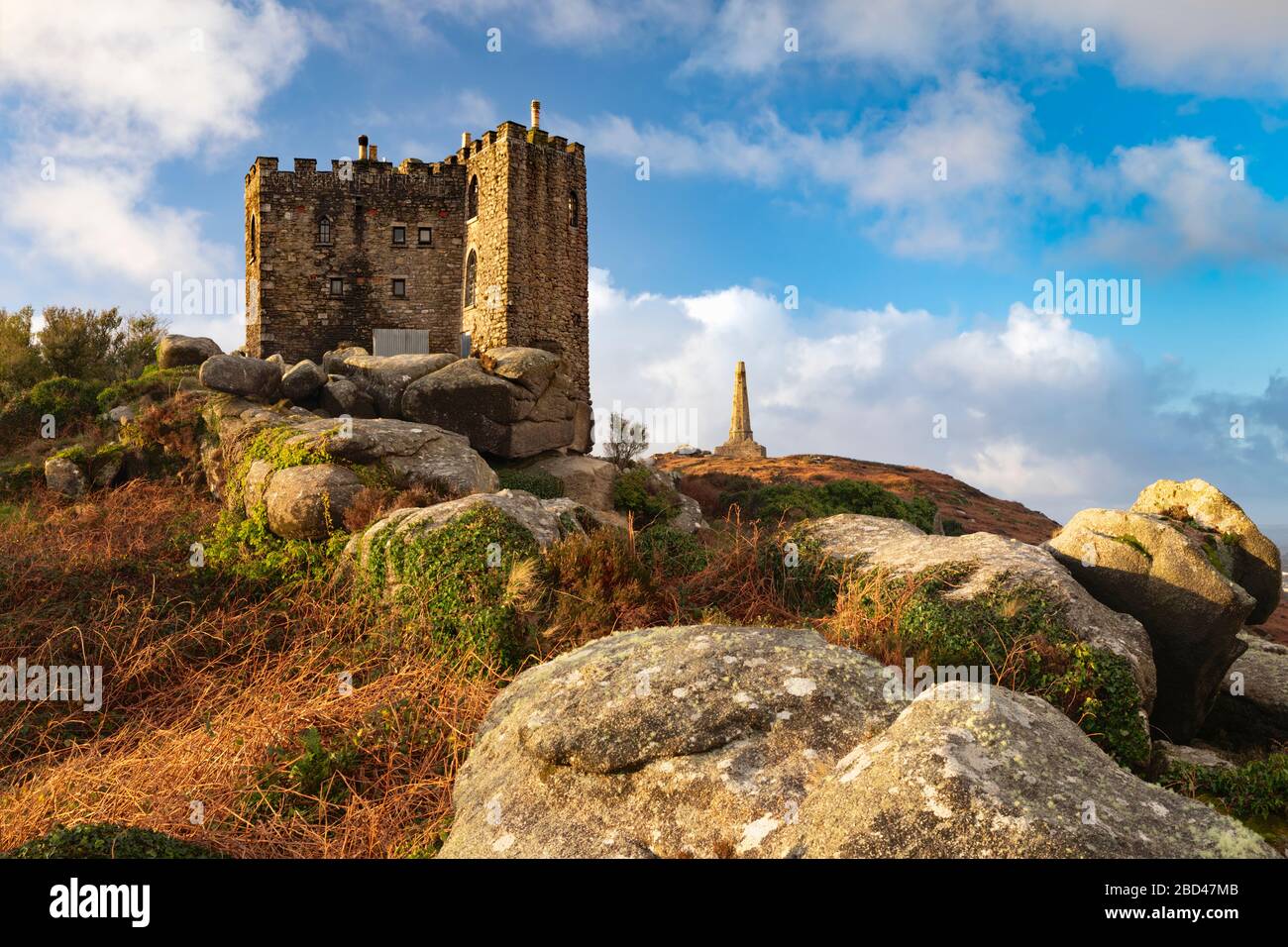 Carn Brea Castle with the Bassett Monument in the distance Stock Photo ...