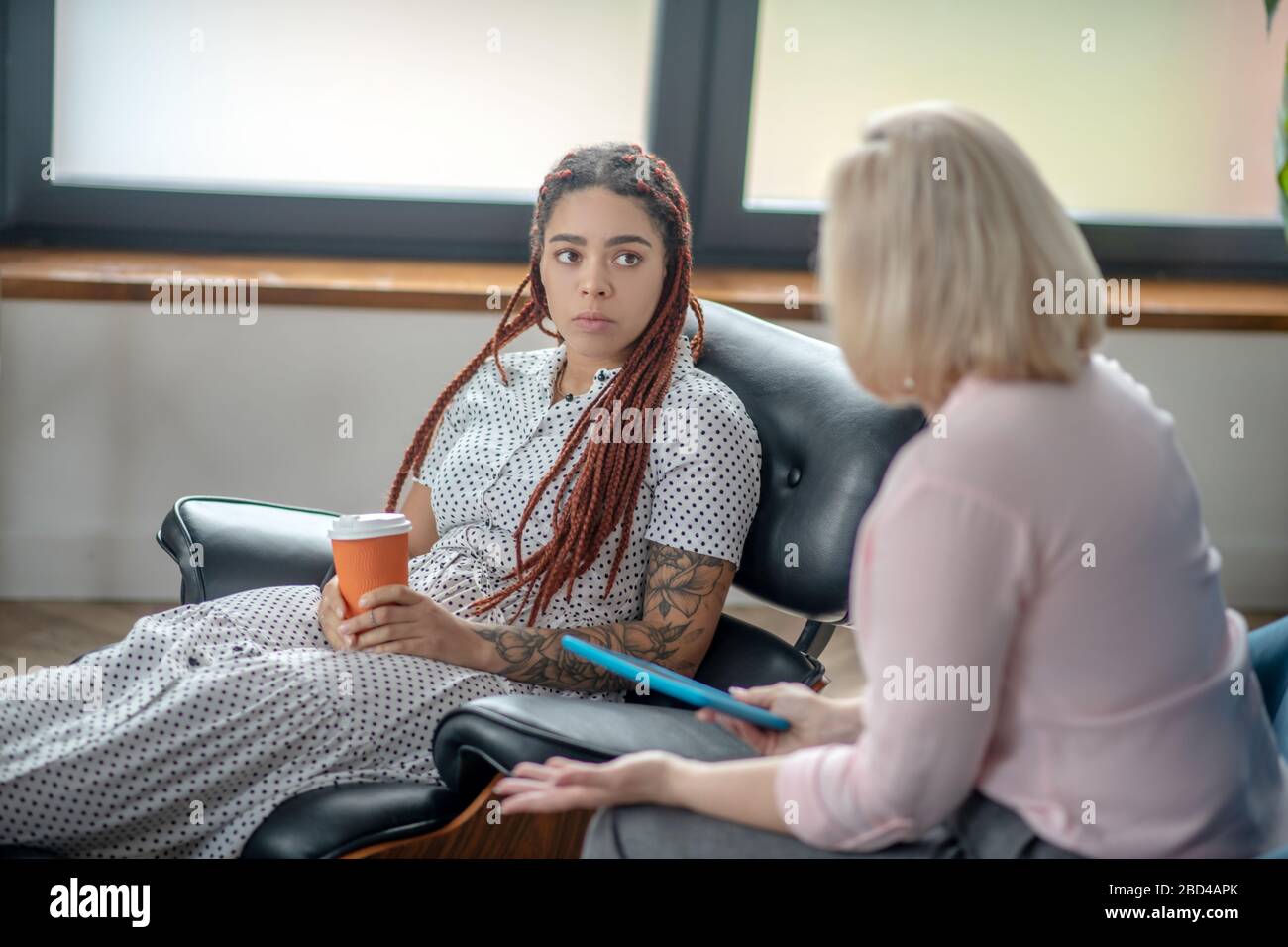 Young woman dreads talking hi-res stock photography and images - Alamy
