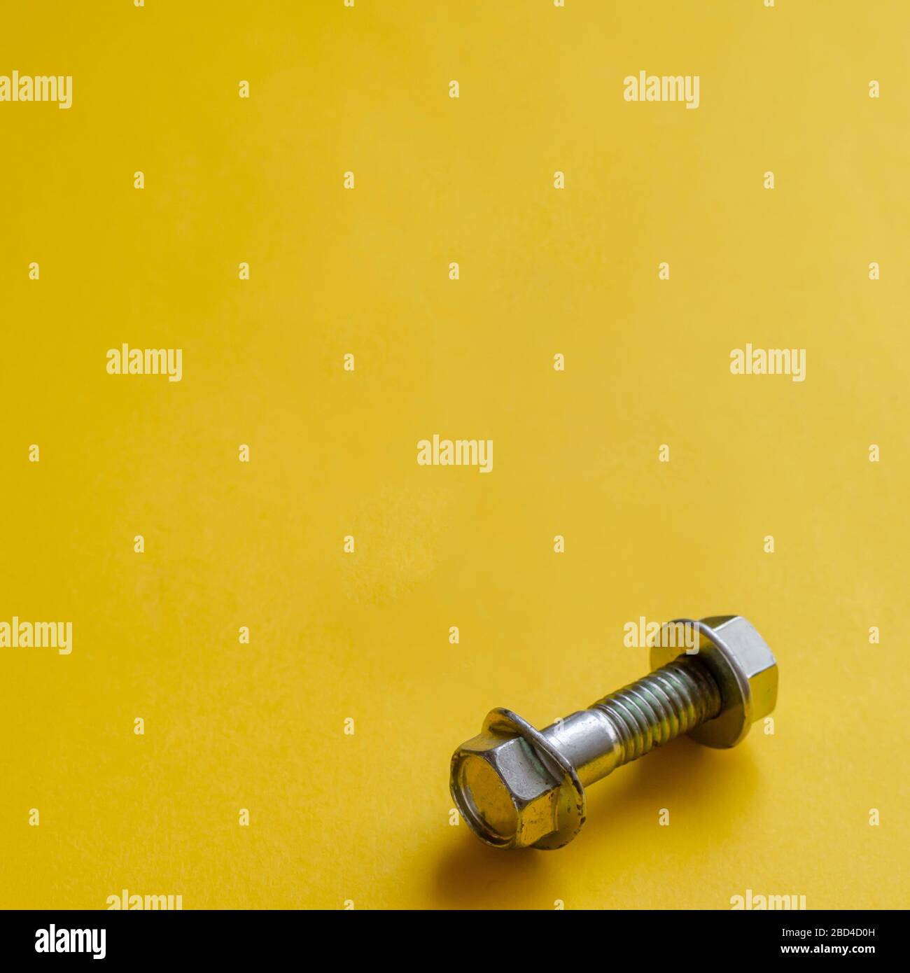 Bolt with nut close-up. One bolt and nut with washer. Industrial themes ...