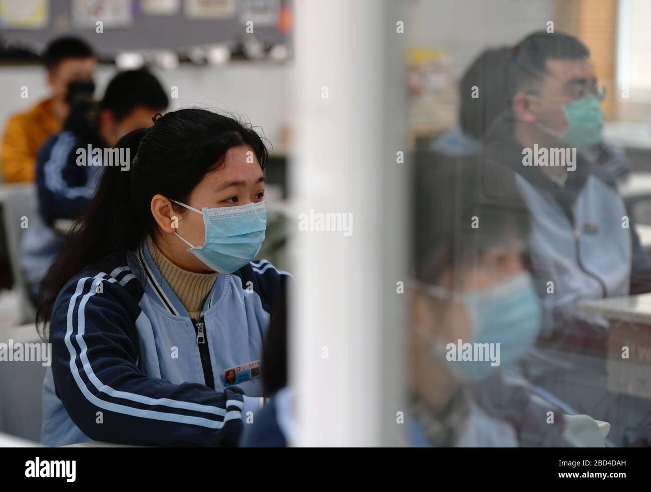 Fuzhou, China's Fujian Province. 7th Apr, 2020. Students attend a class ...