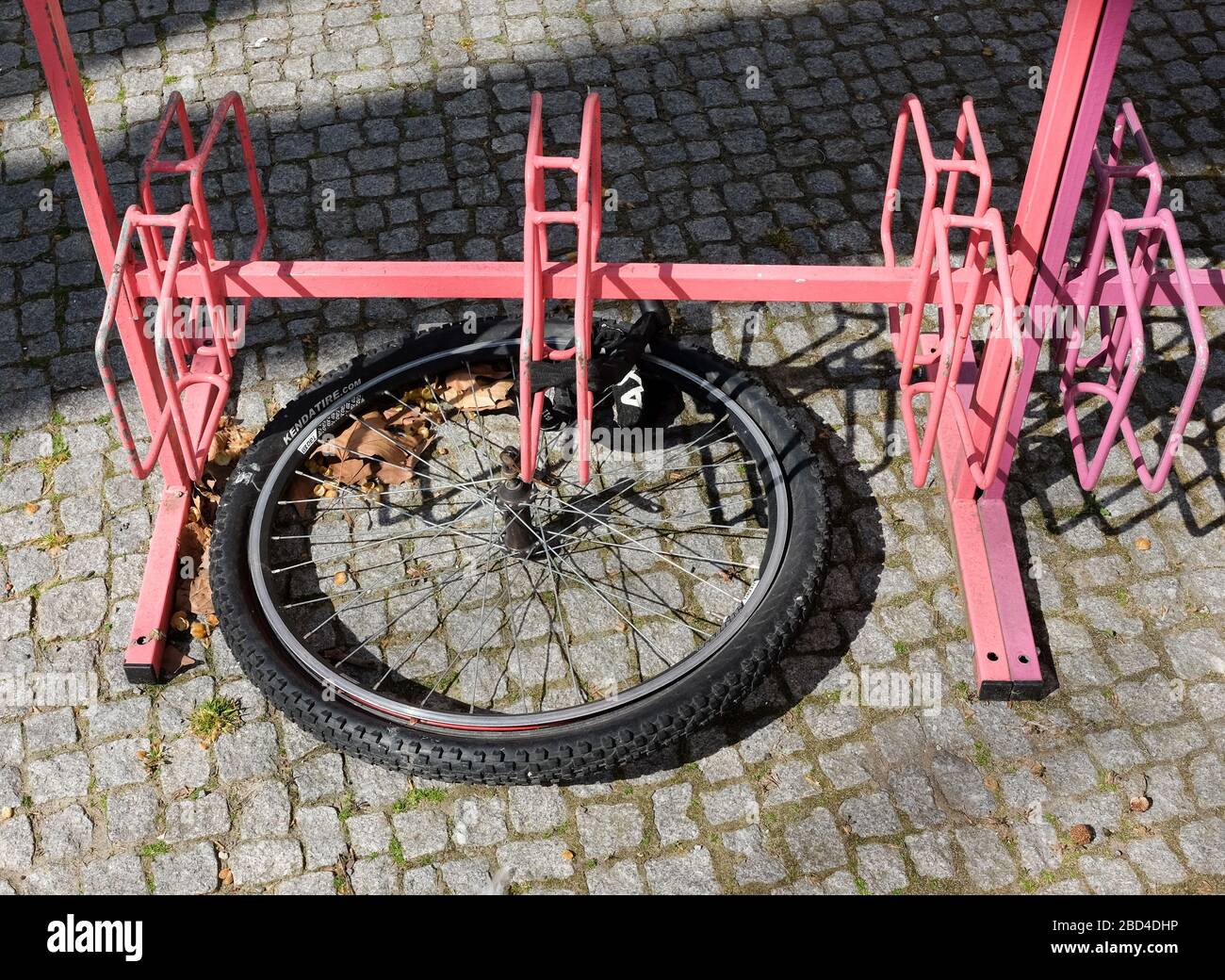 Berlin, Germany. 06th Apr, 2020. Only the front wheel of a bicycle is ...