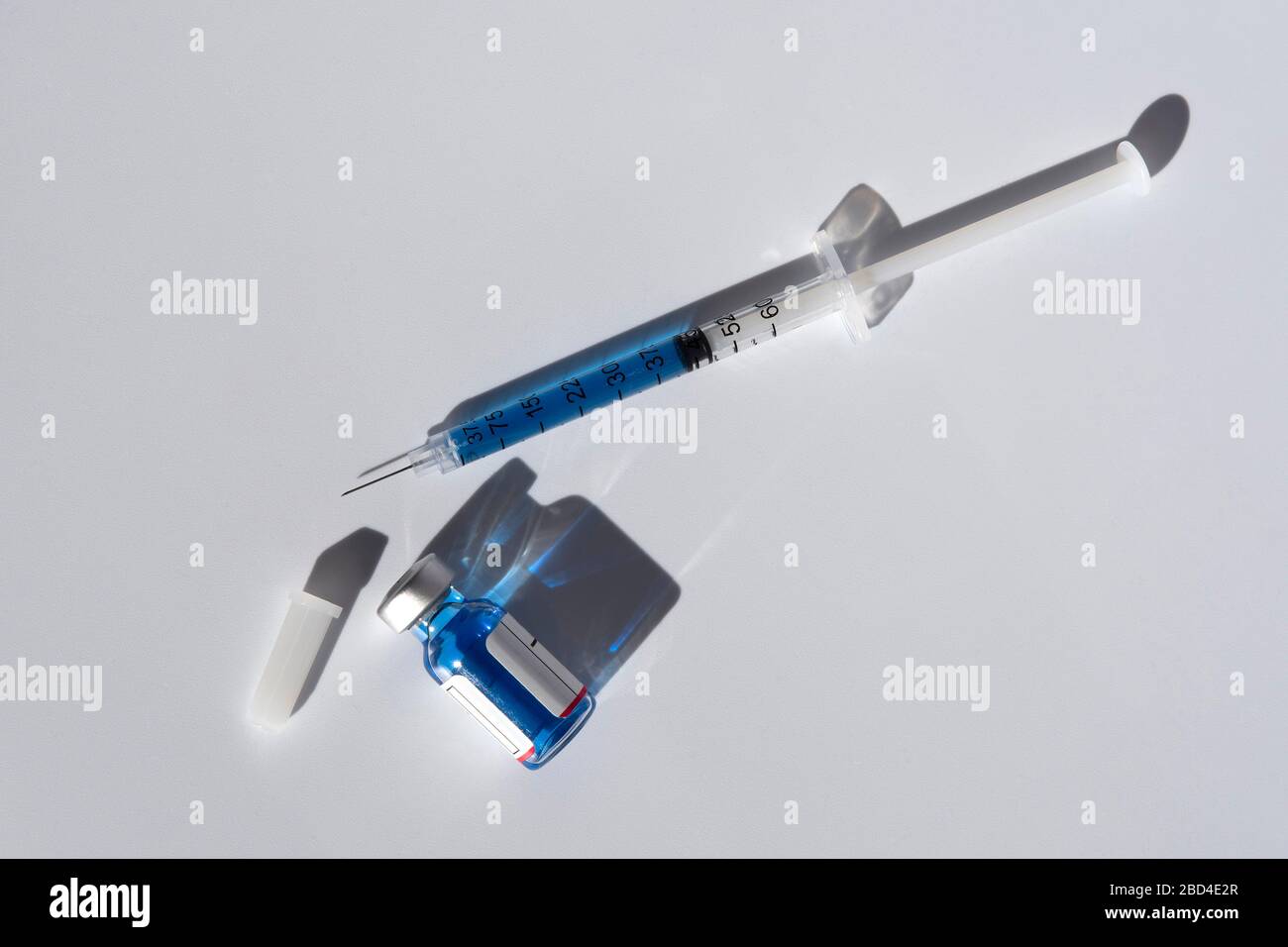 Close-up of a syringe and a vial of injectable solution Stock Photo - Alamy