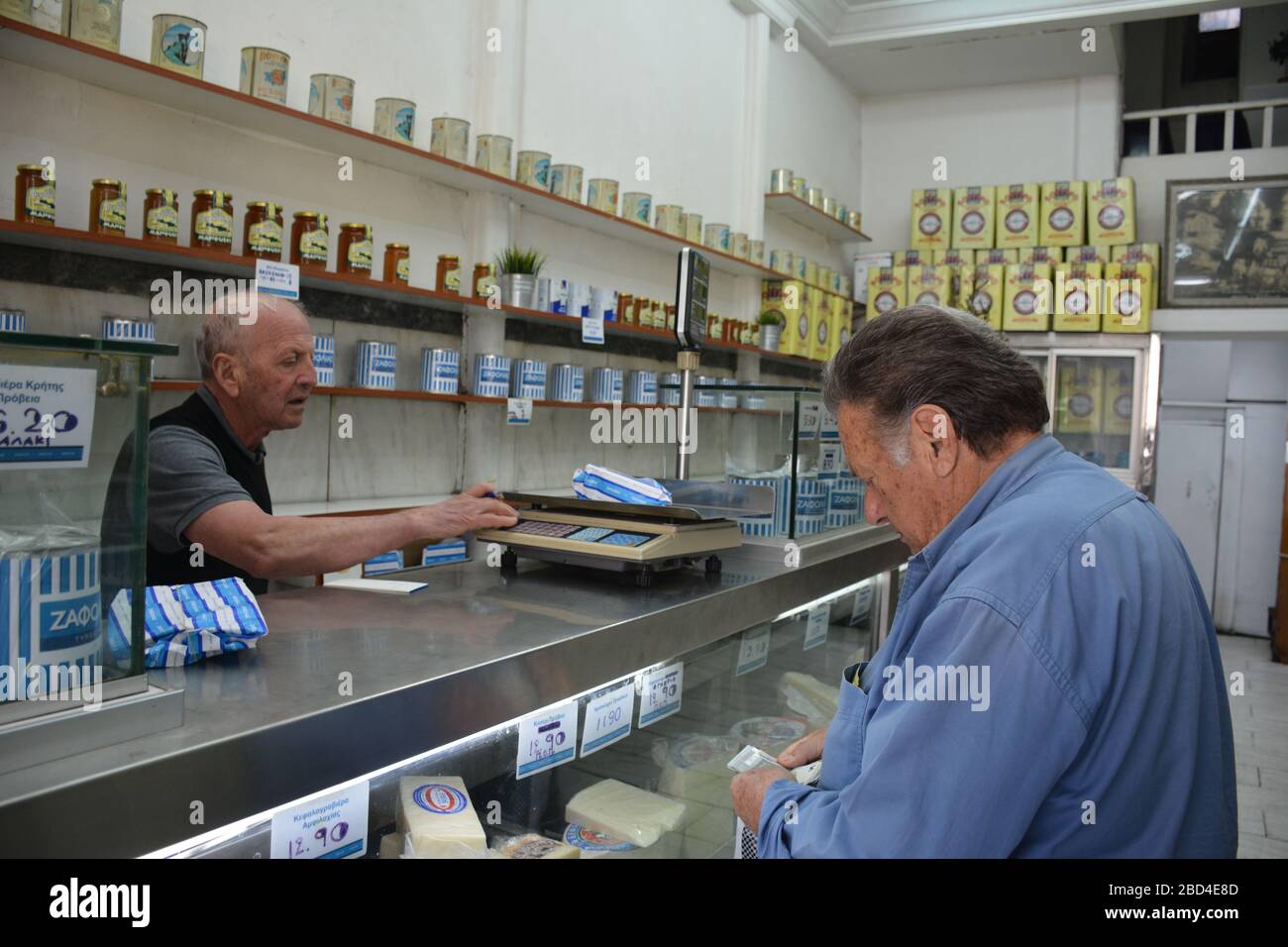 Greek shopkeeper hi-res stock photography and images - Alamy