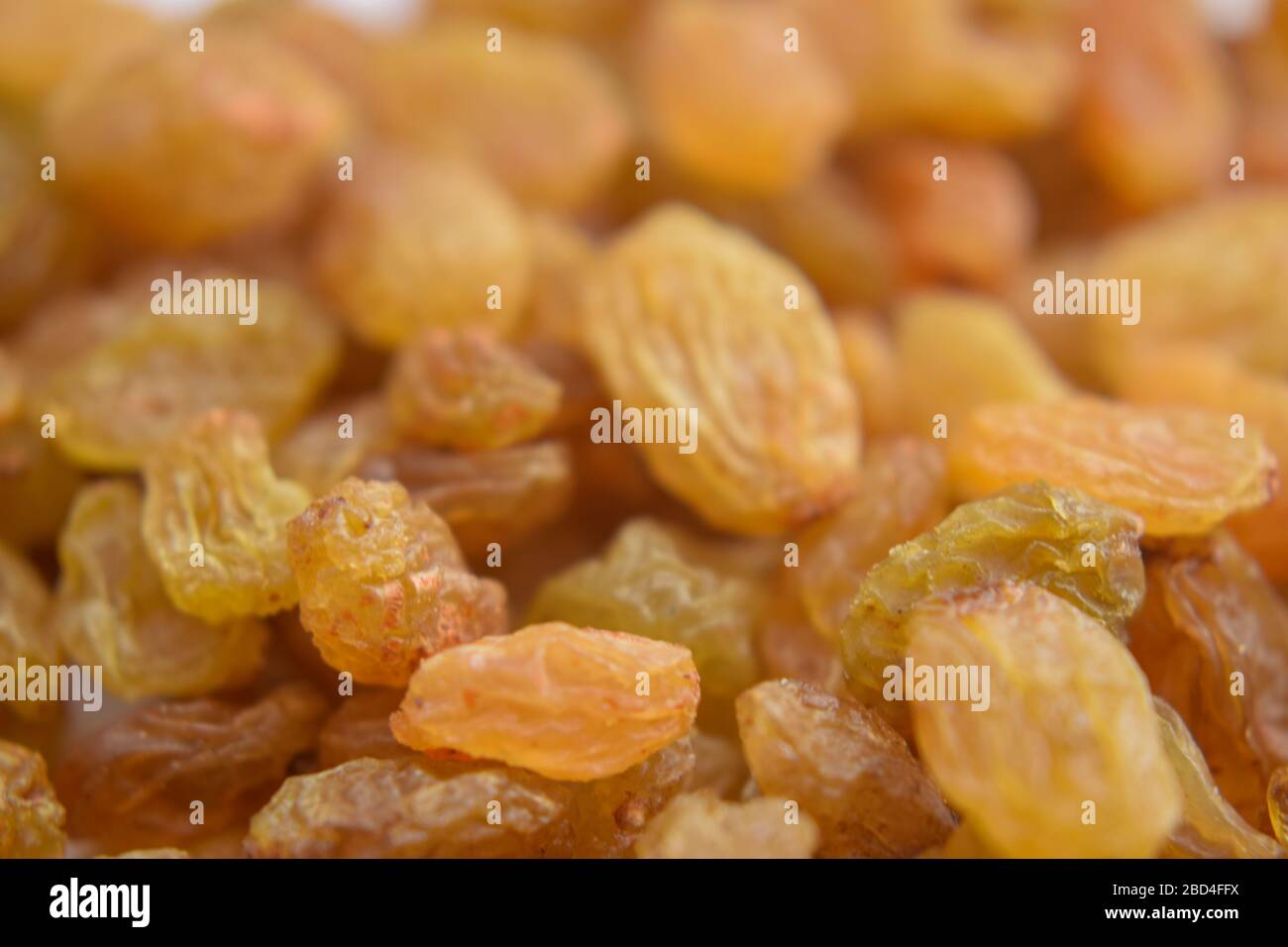 Yellow golden raisins isolated on white background Close-Up Stock ...