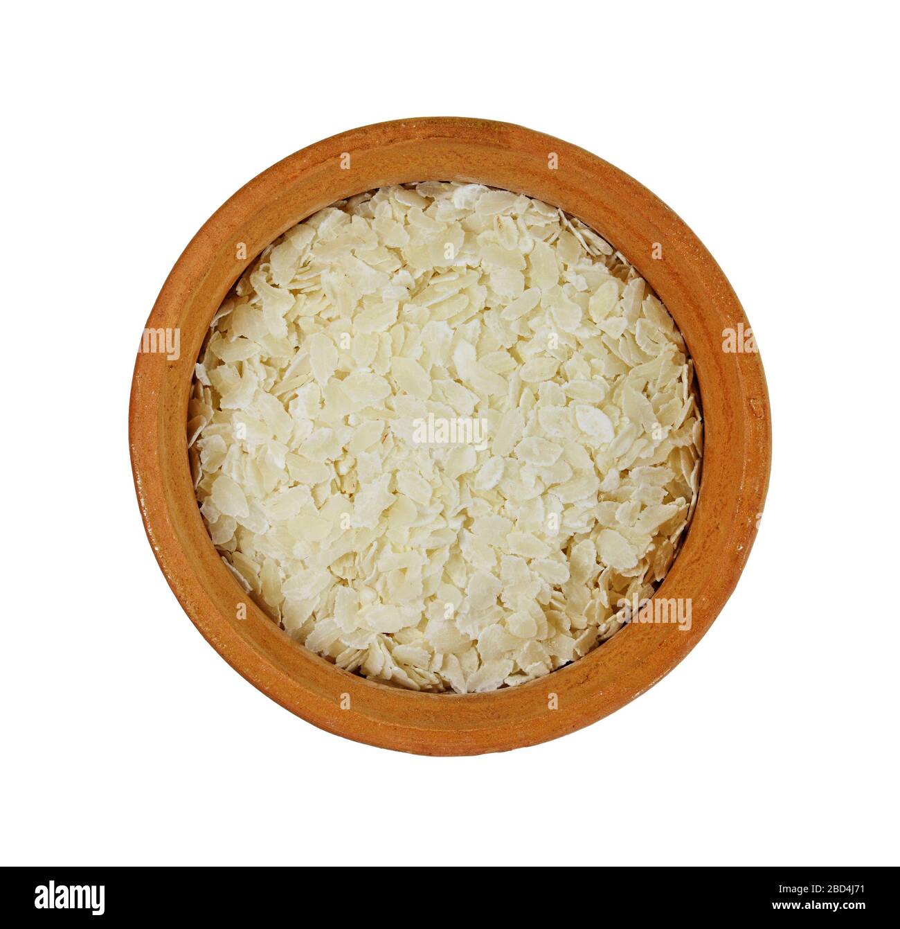 flattened rice flakes in a ceramic bowl isolated on white Stock Photo ...
