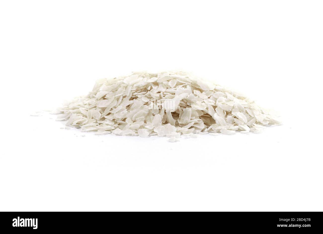 flattened rice flakes isolated on white Stock Photo - Alamy