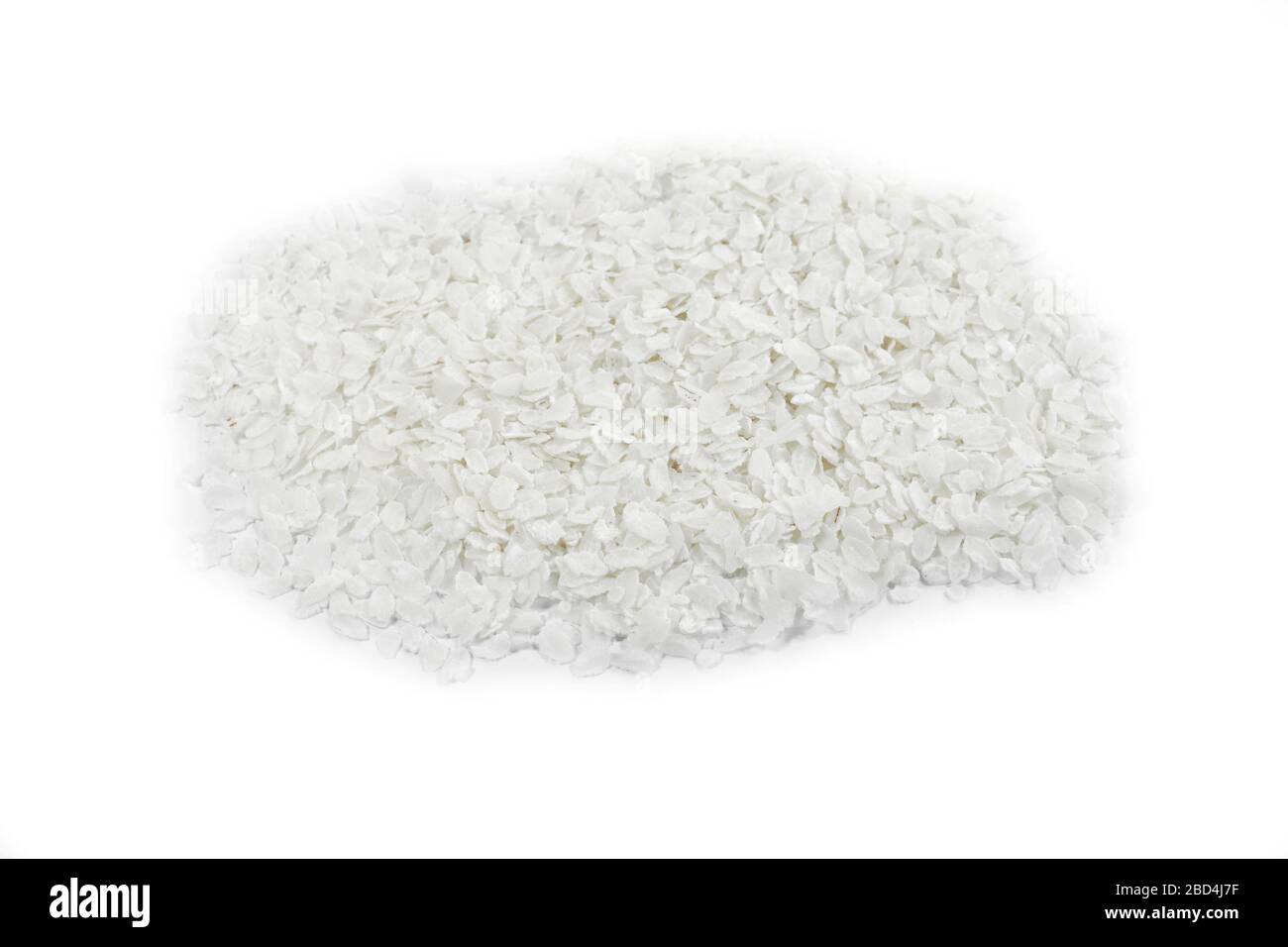 flattened rice flakes isolated on white Stock Photo - Alamy