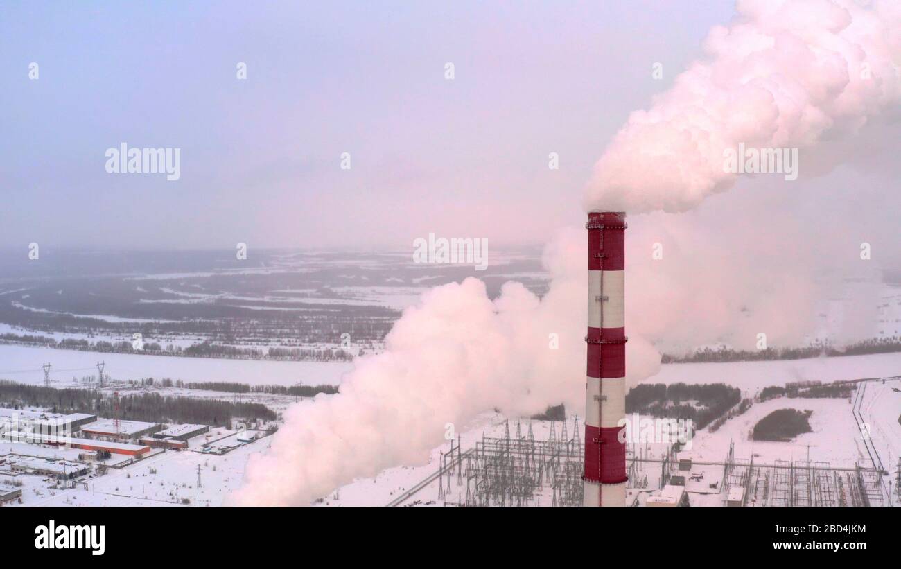 Aerial view. Emission to atmosphere from industrial pipes. Smokestack ...