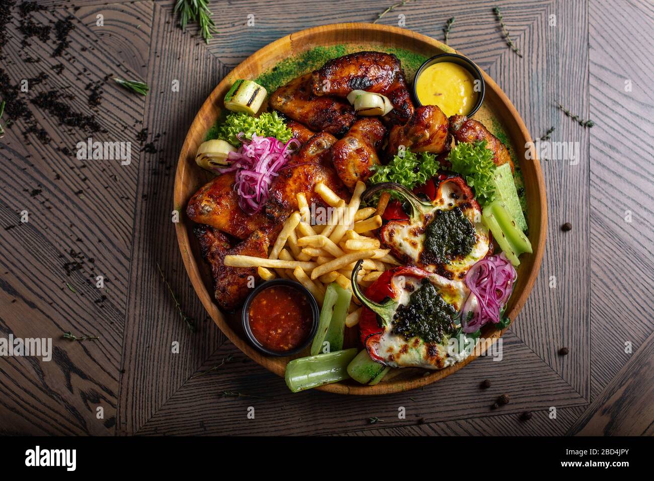 Fried chicken wings and French fries. Menu Stock Photo - Alamy